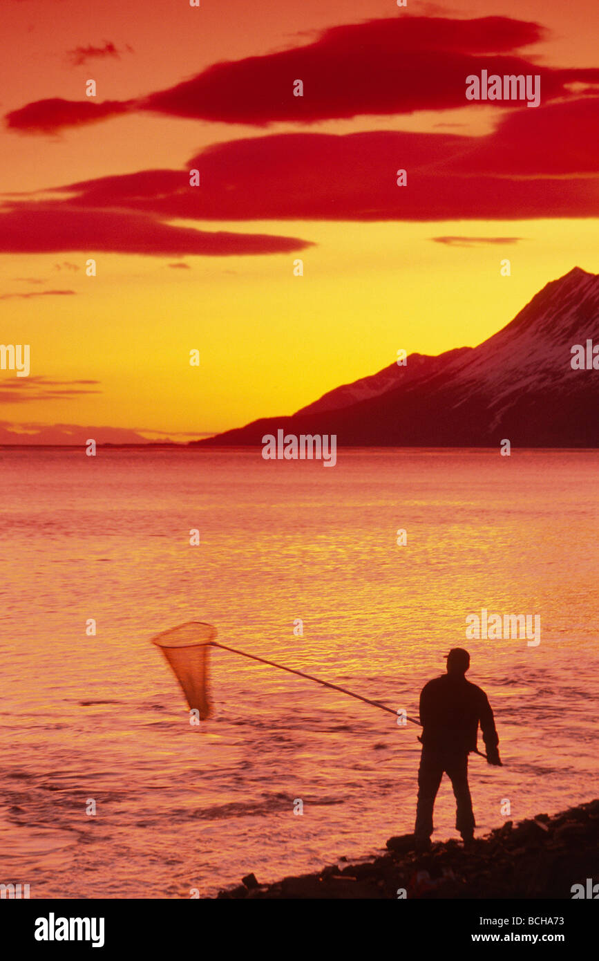 Man Hooligan Fishing Sunset Turnagain Arm SC Alaska Stock Photo - Alamy
