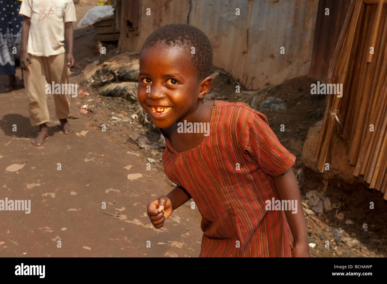 Smiling child in African slum Stock Photo - Alamy