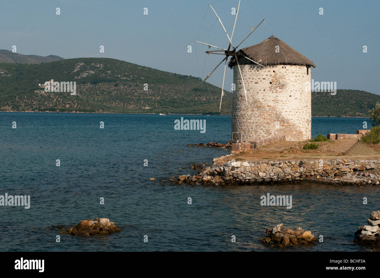 Ancient Greek windmill by the Aegean sea on the island of Lesvos Stock ...