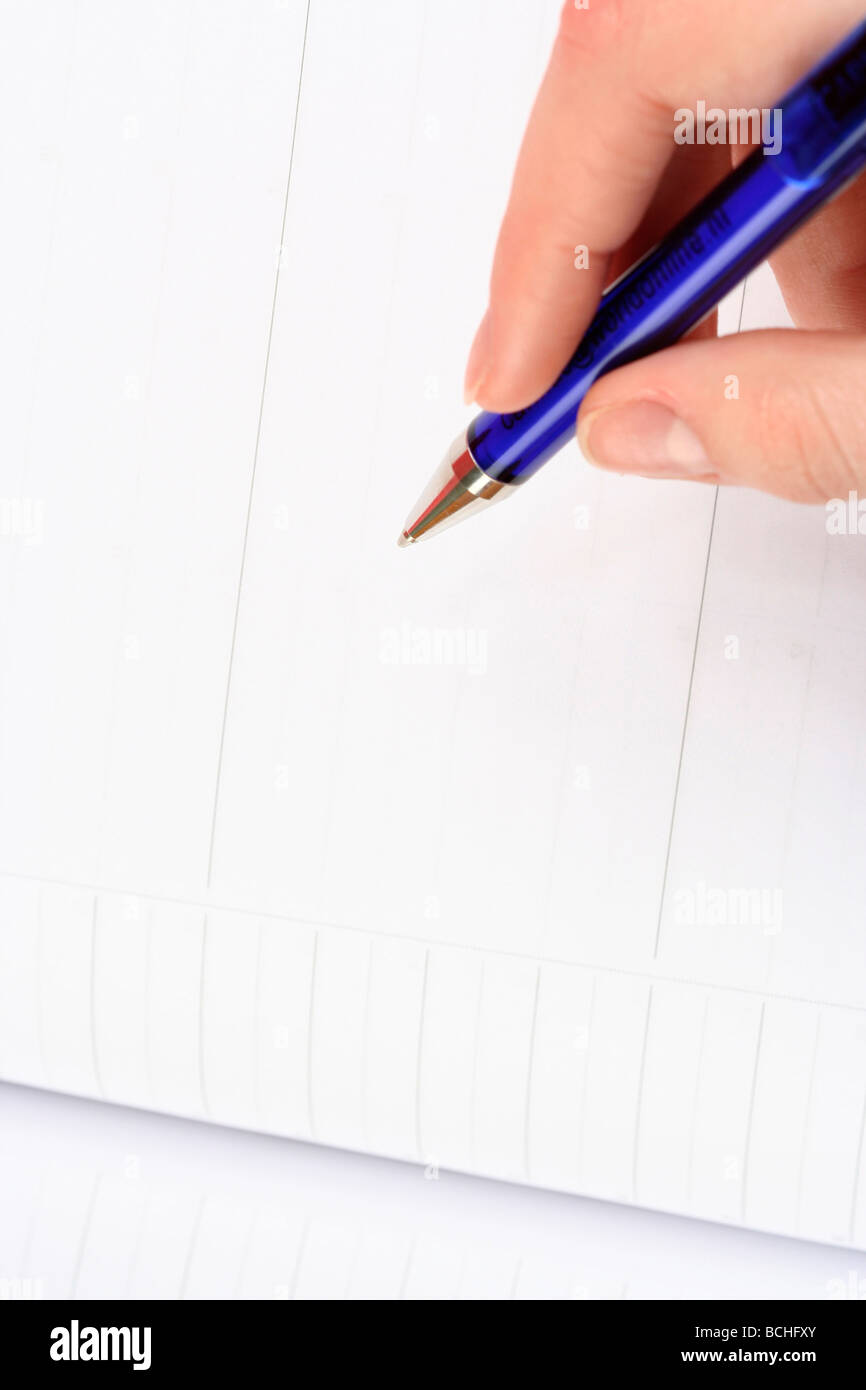 Close-up of woman hand writing in agenda Stock Photo - Alamy