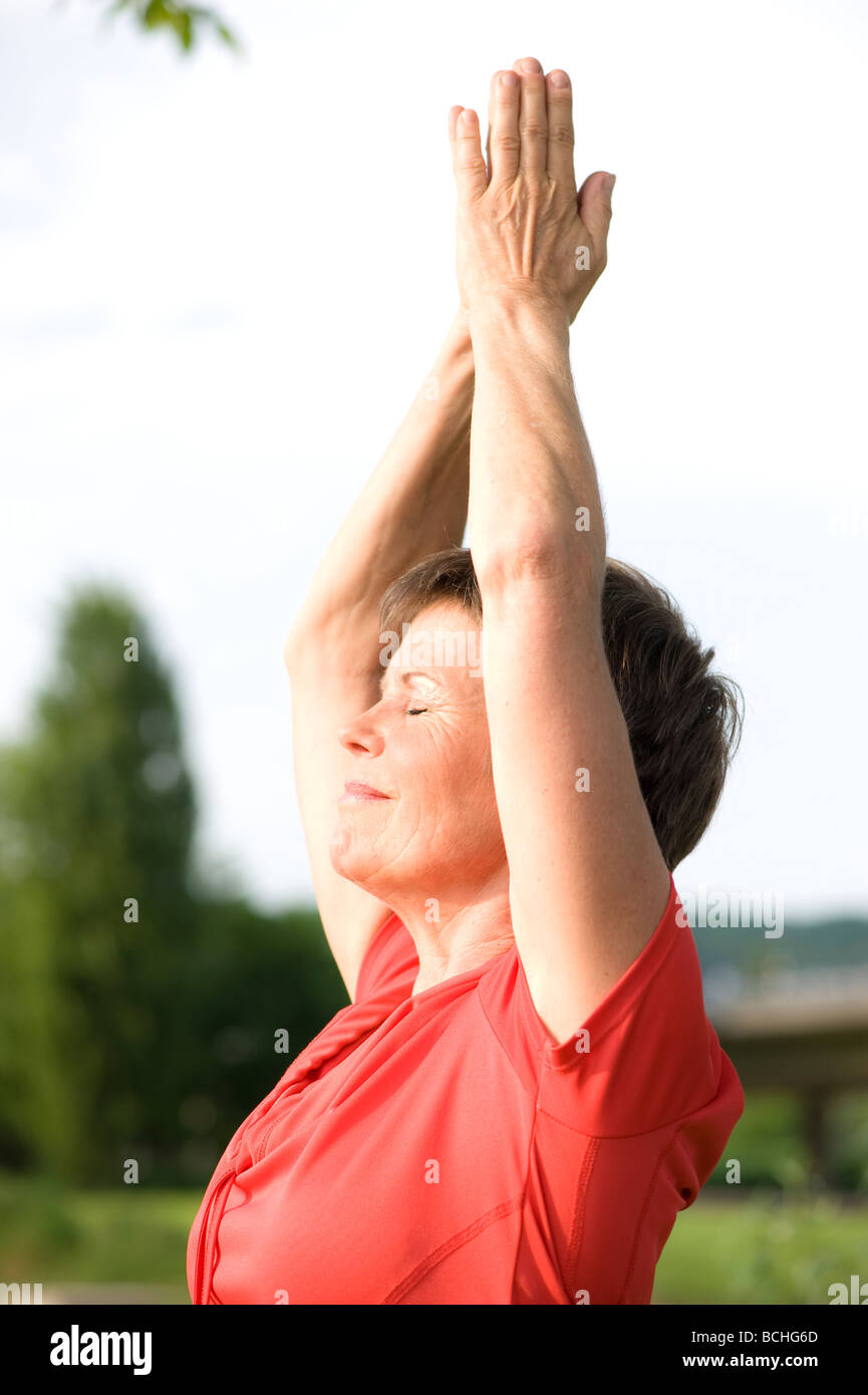 Nia and Pilates master meditating Stock Photo - Alamy