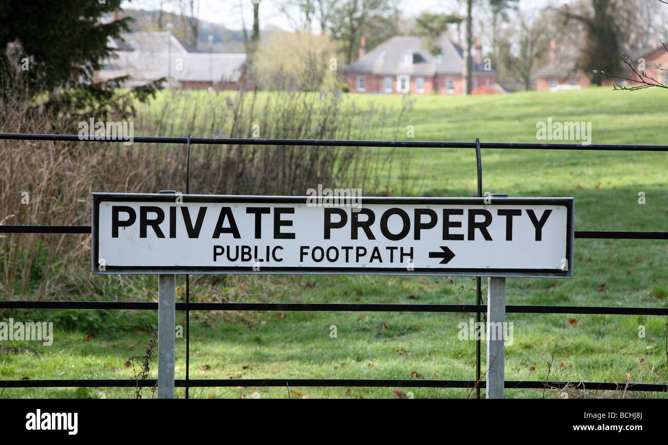 A private property sign showing which direction the public footpath is ...