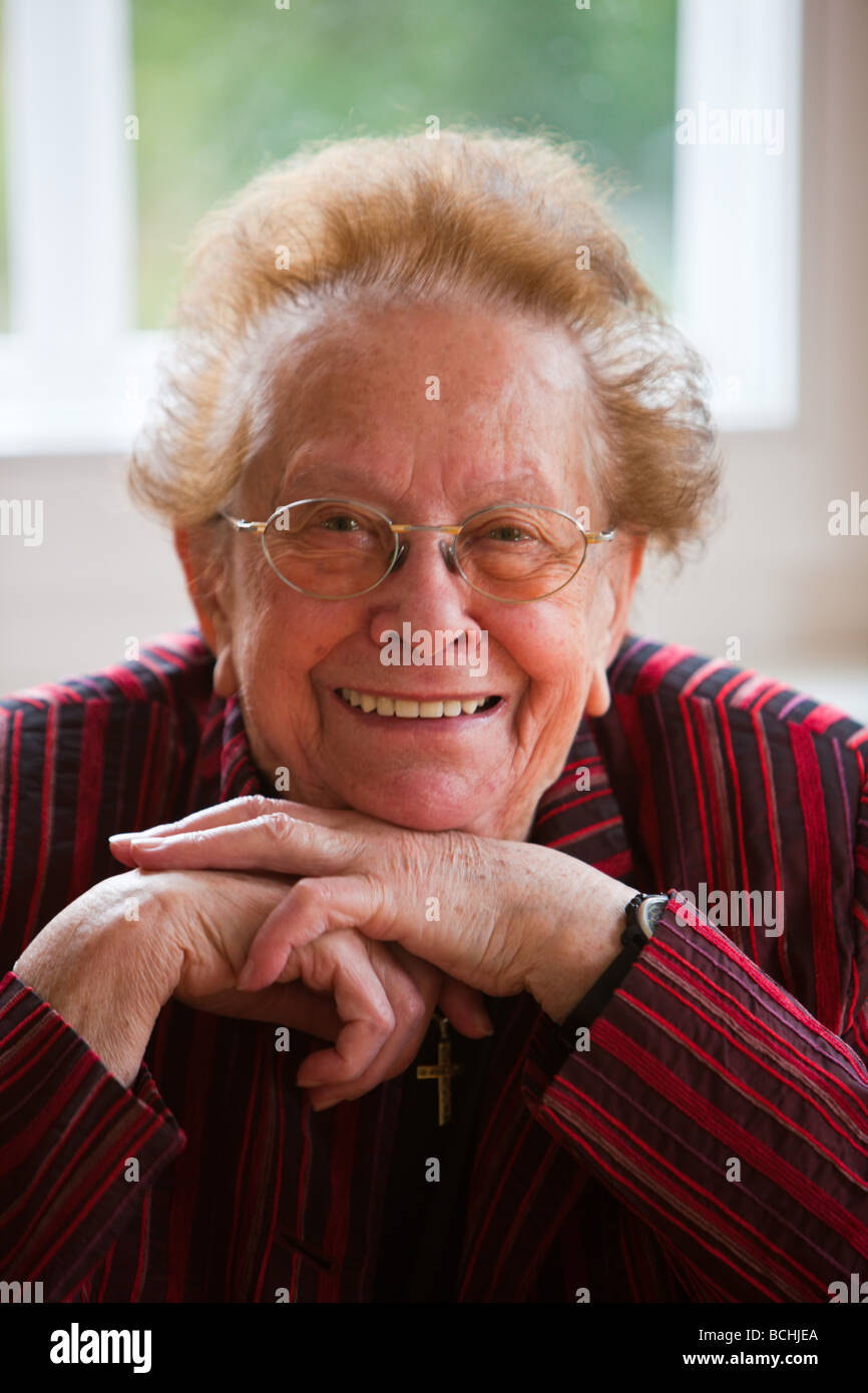 Portrait of a smiling old friendly woman Stock Photo - Alamy