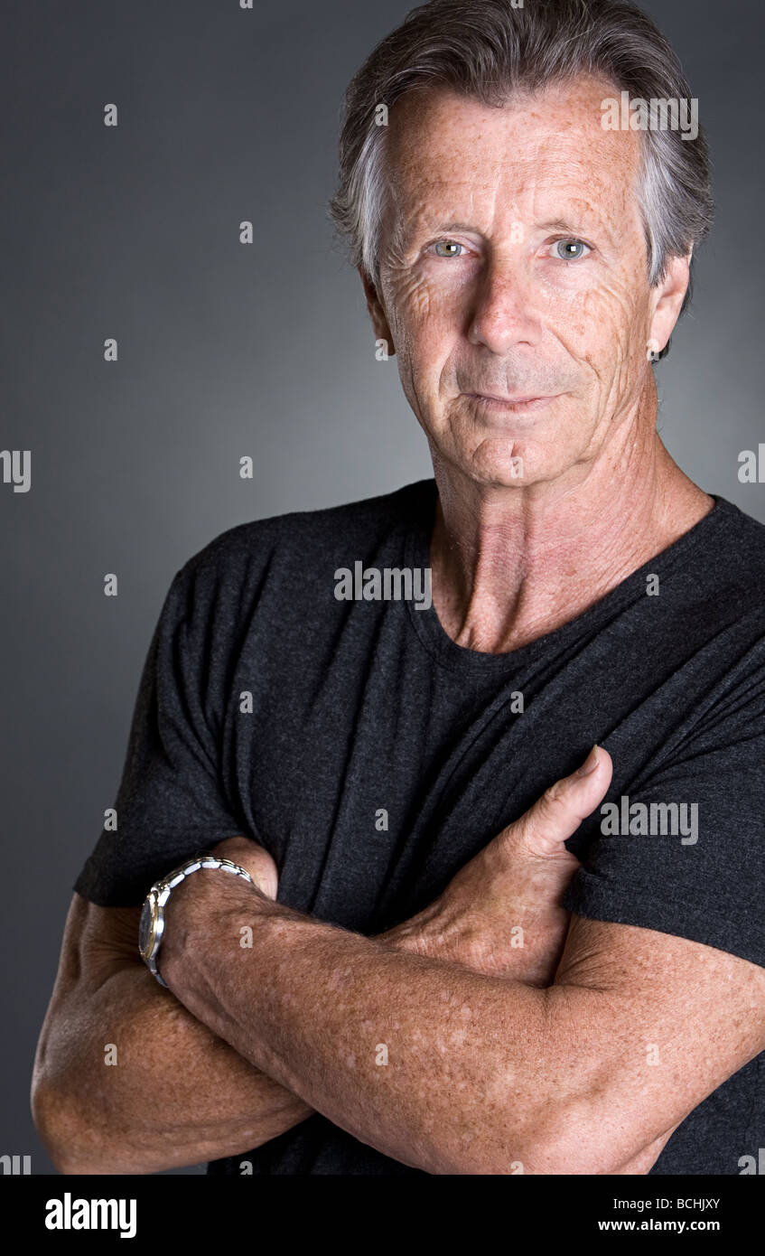 Senior man arms fold hi-res stock photography and images - Alamy