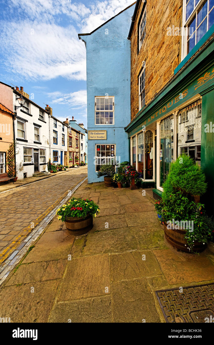 Cobbled streets, and picturesque shops and cottages typical of the ...