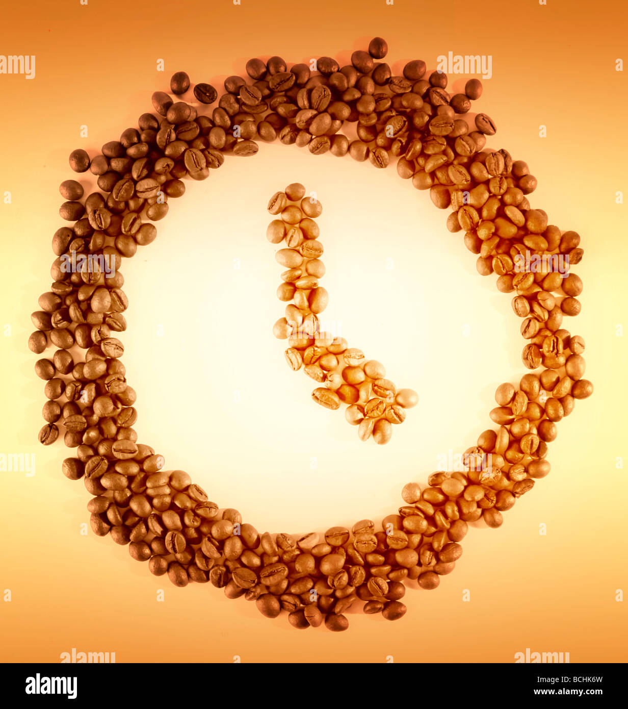 Clock made from coffee beans Stock Photo - Alamy