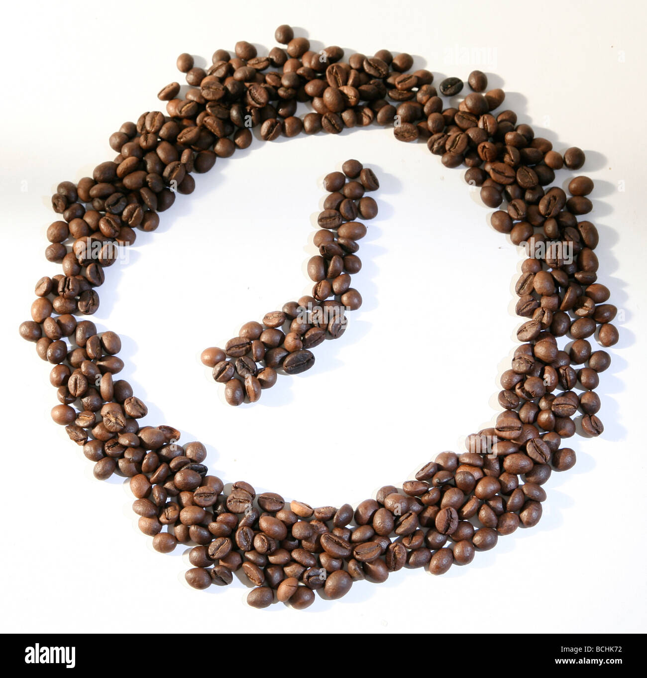 Clock made from coffee beans Stock Photo - Alamy