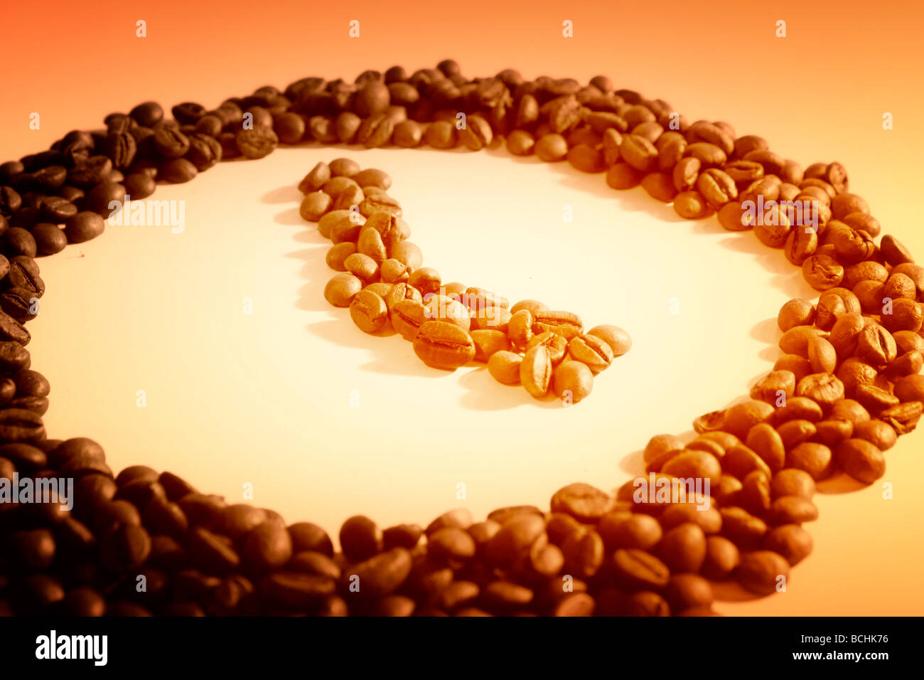 Clock made from coffee beans Stock Photo - Alamy