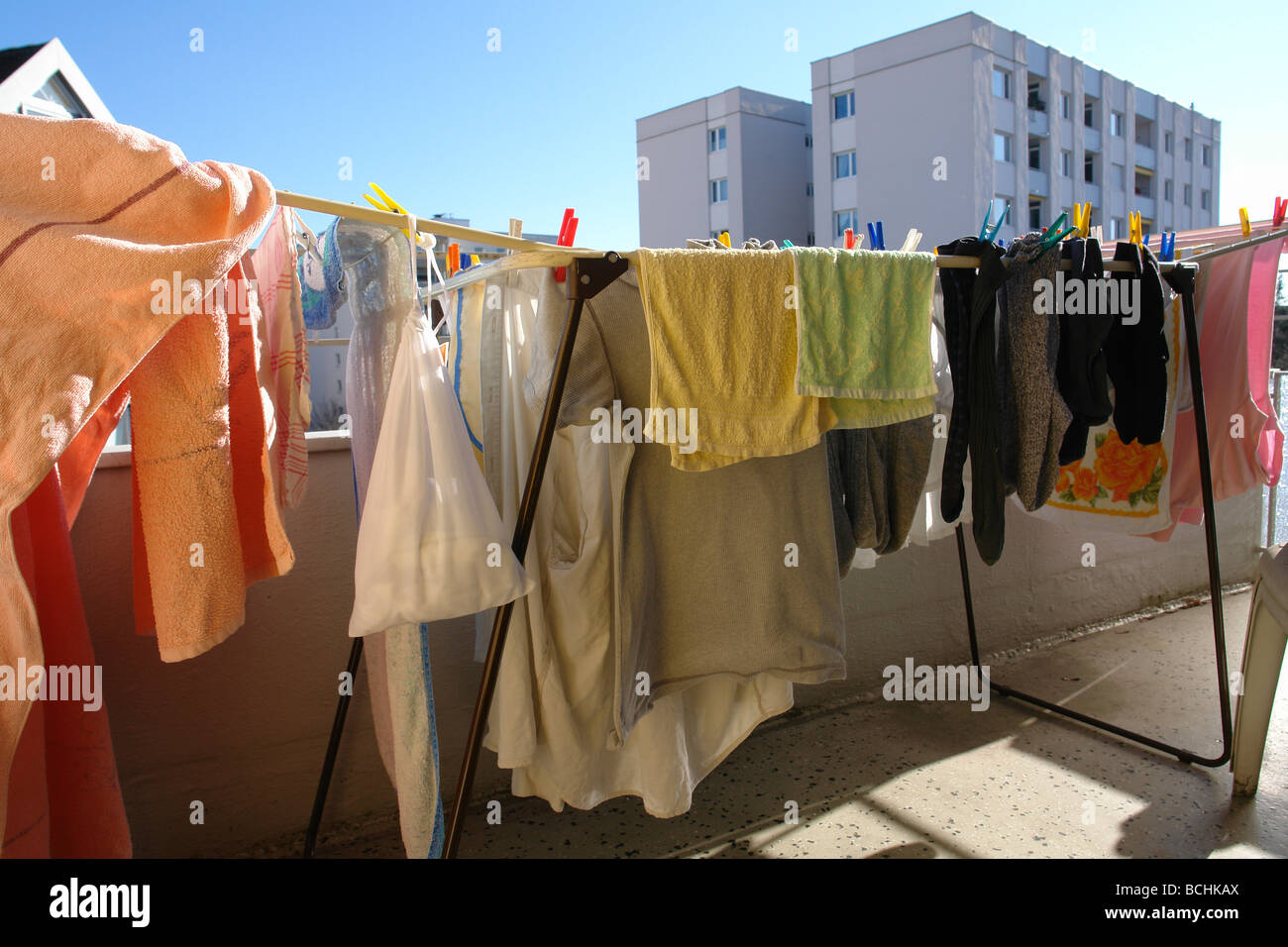 Laundry being dry at balcony Stock Photo - Alamy