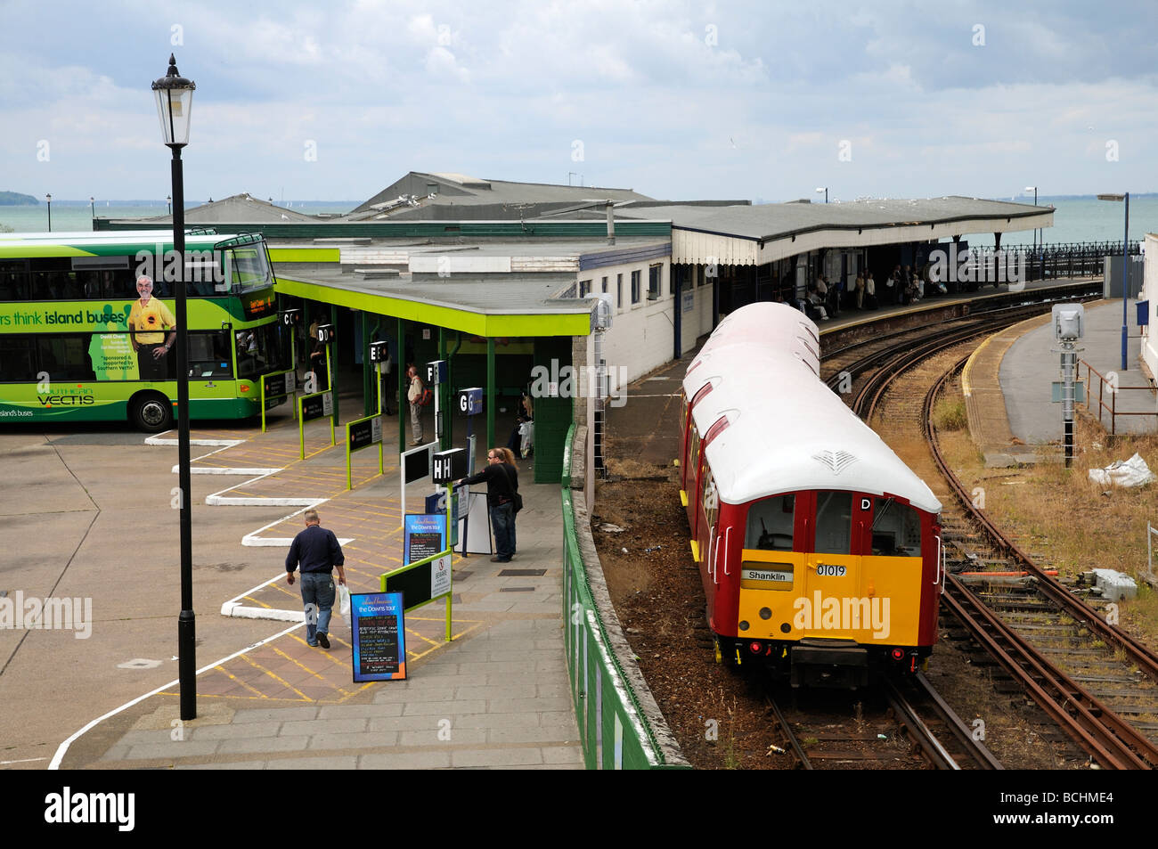 Ryde Esplanade bus depot and electric passenger train approaching ...