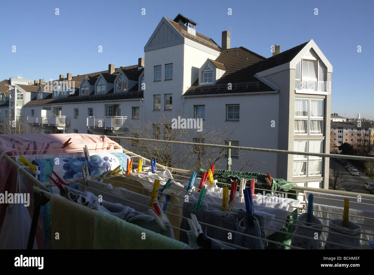 Laundry being dry at balcony Stock Photo - Alamy