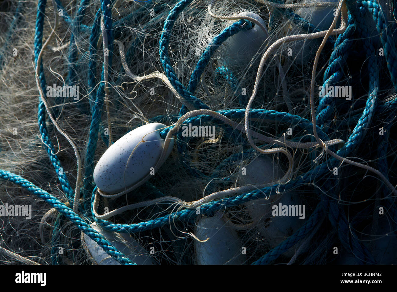 Fishing net with float Stock Photo - Alamy