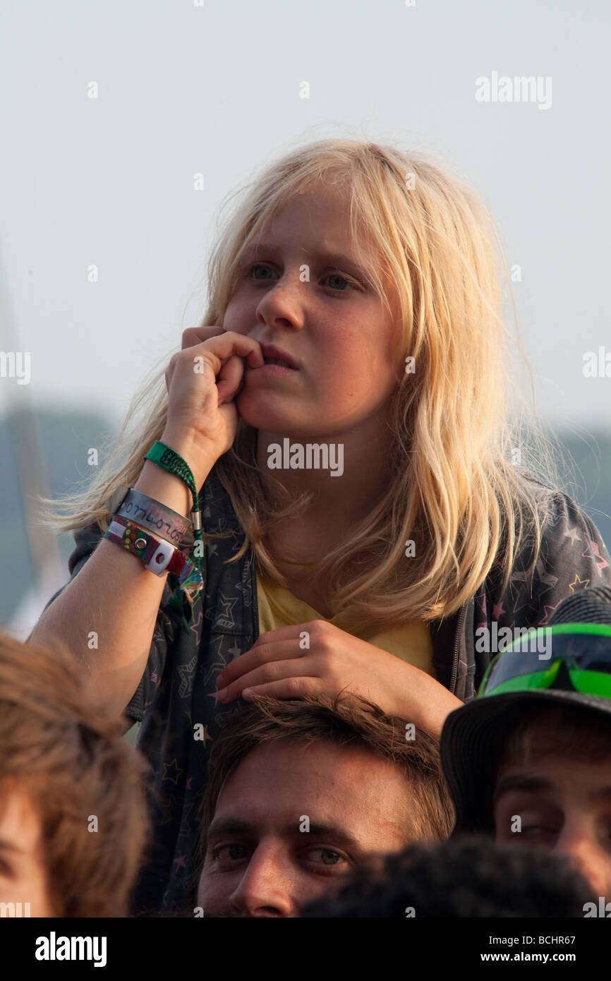 Girl in the crowd at Glastonbury Festival 2009 Somerset England Stock ...