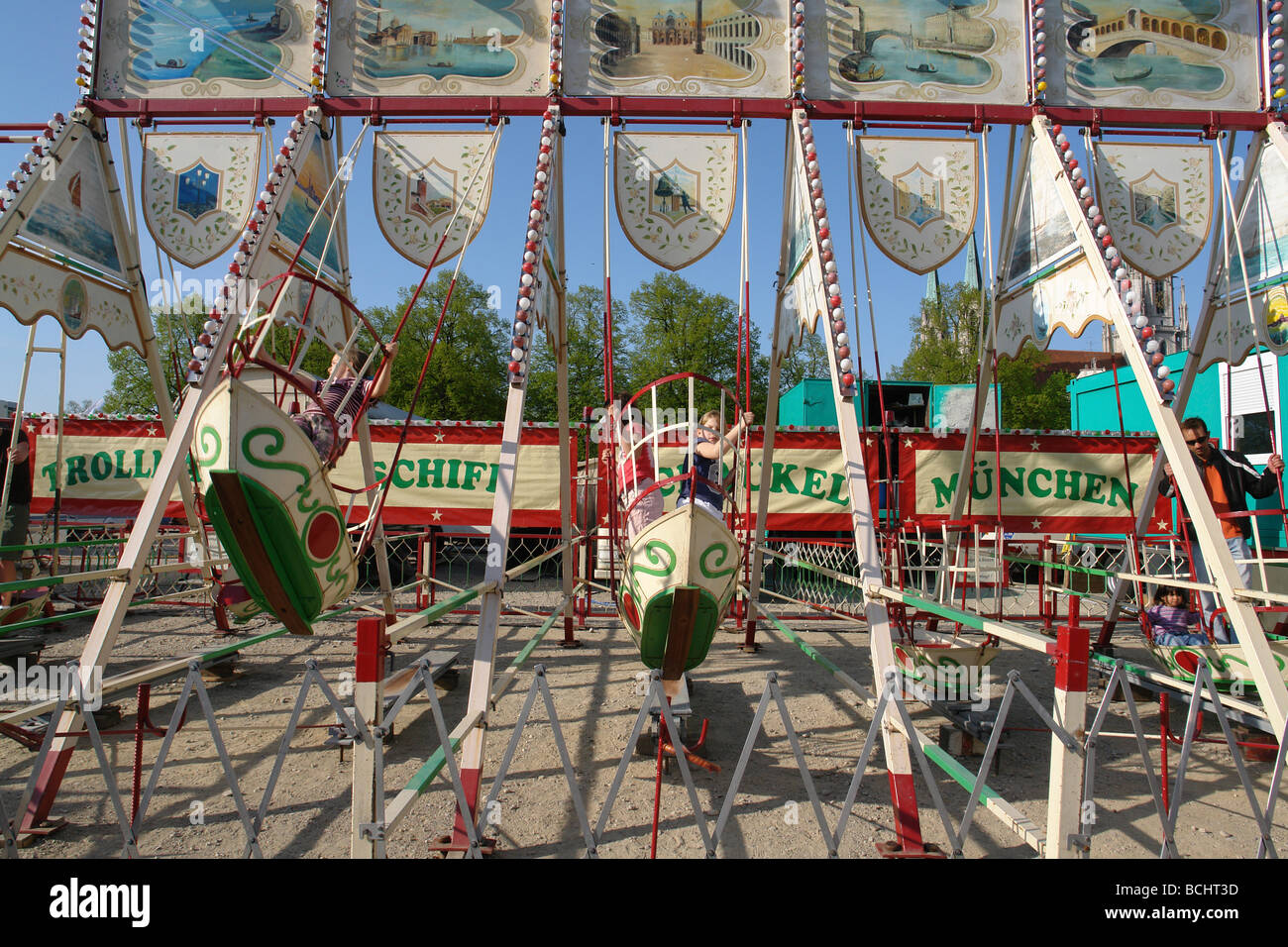 Little girls play nostalgic Swing at Oktoberfest Munich Bavaria Germany ...