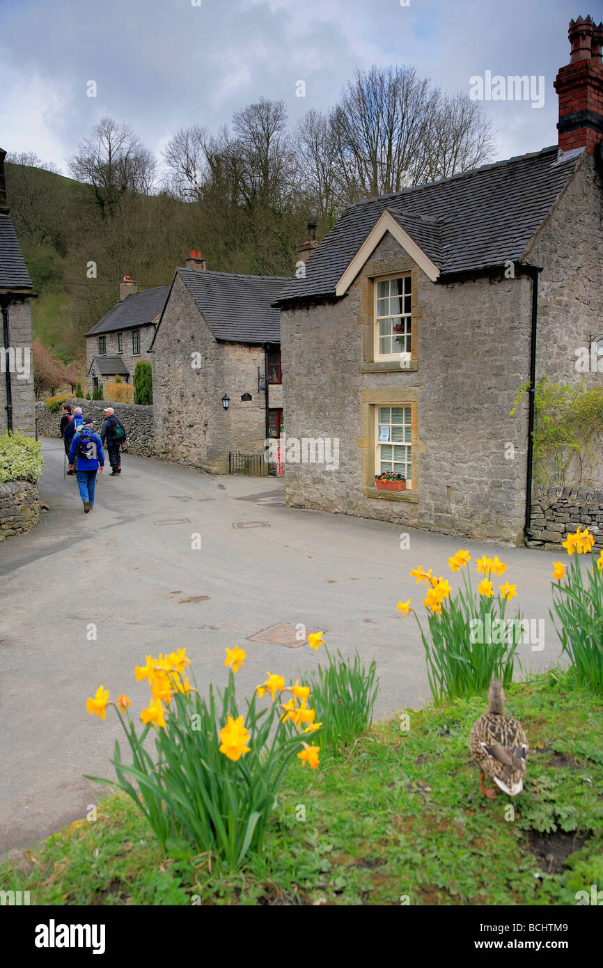 Walkers at Milldale village White Peak Area Peak District National Park ...
