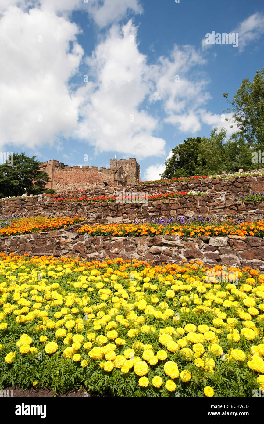 castle overlooking summer flower display in a park Stock Photo - Alamy
