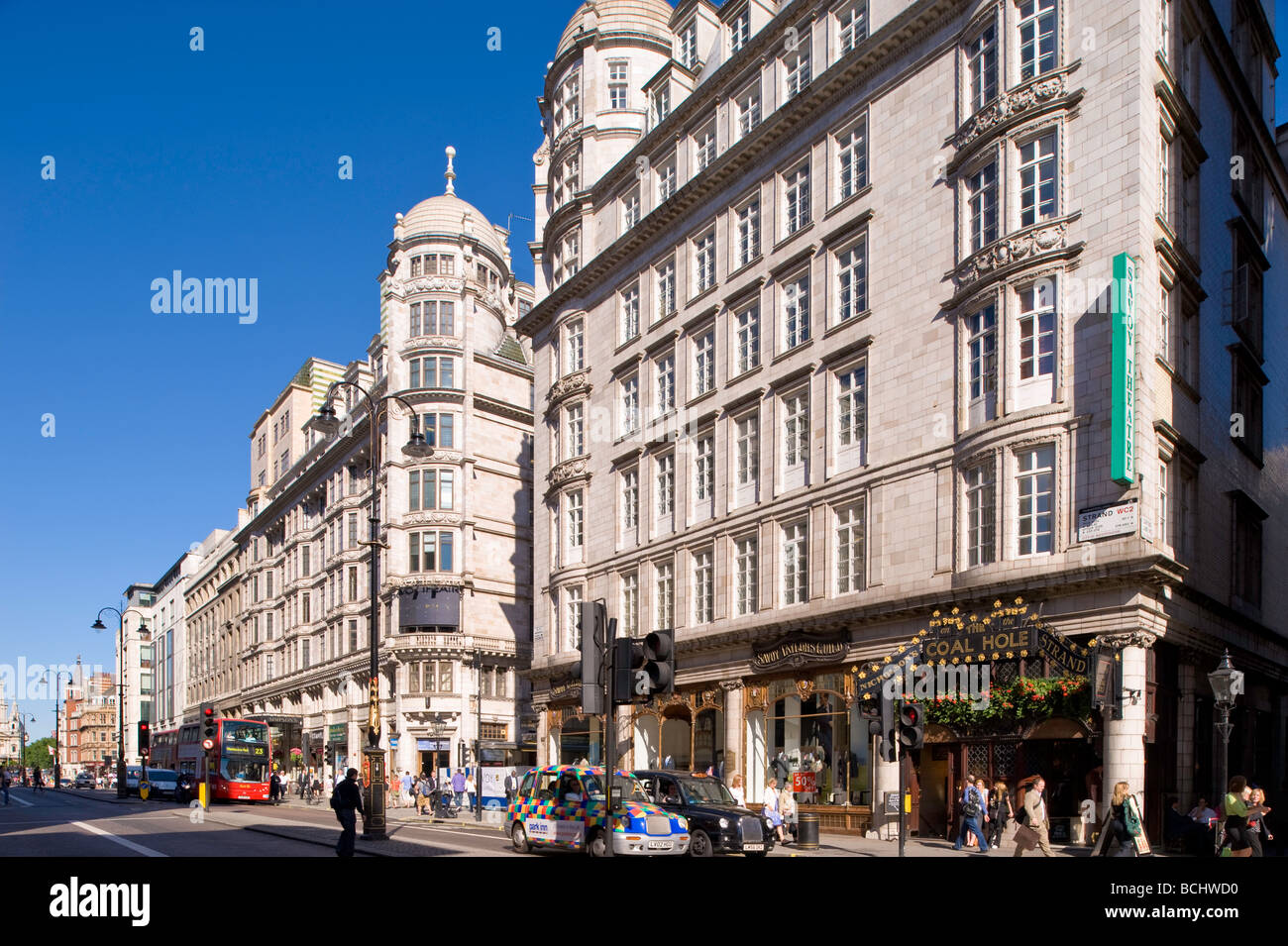 Traffic and pedestrians on The Strand WC2 London United Kingdom Stock ...