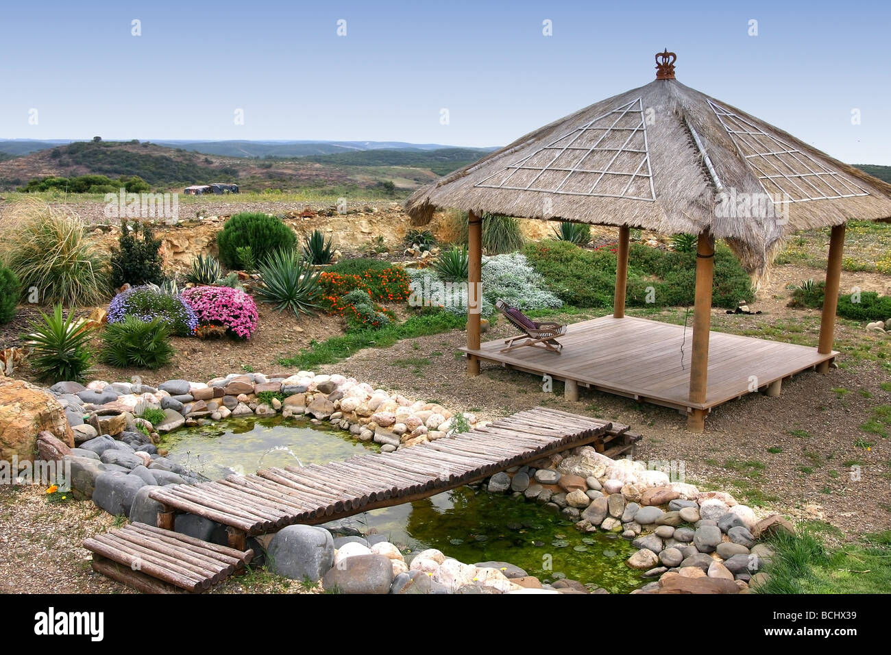 Oriental relax garden with chairs and great scenic Stock Photo - Alamy