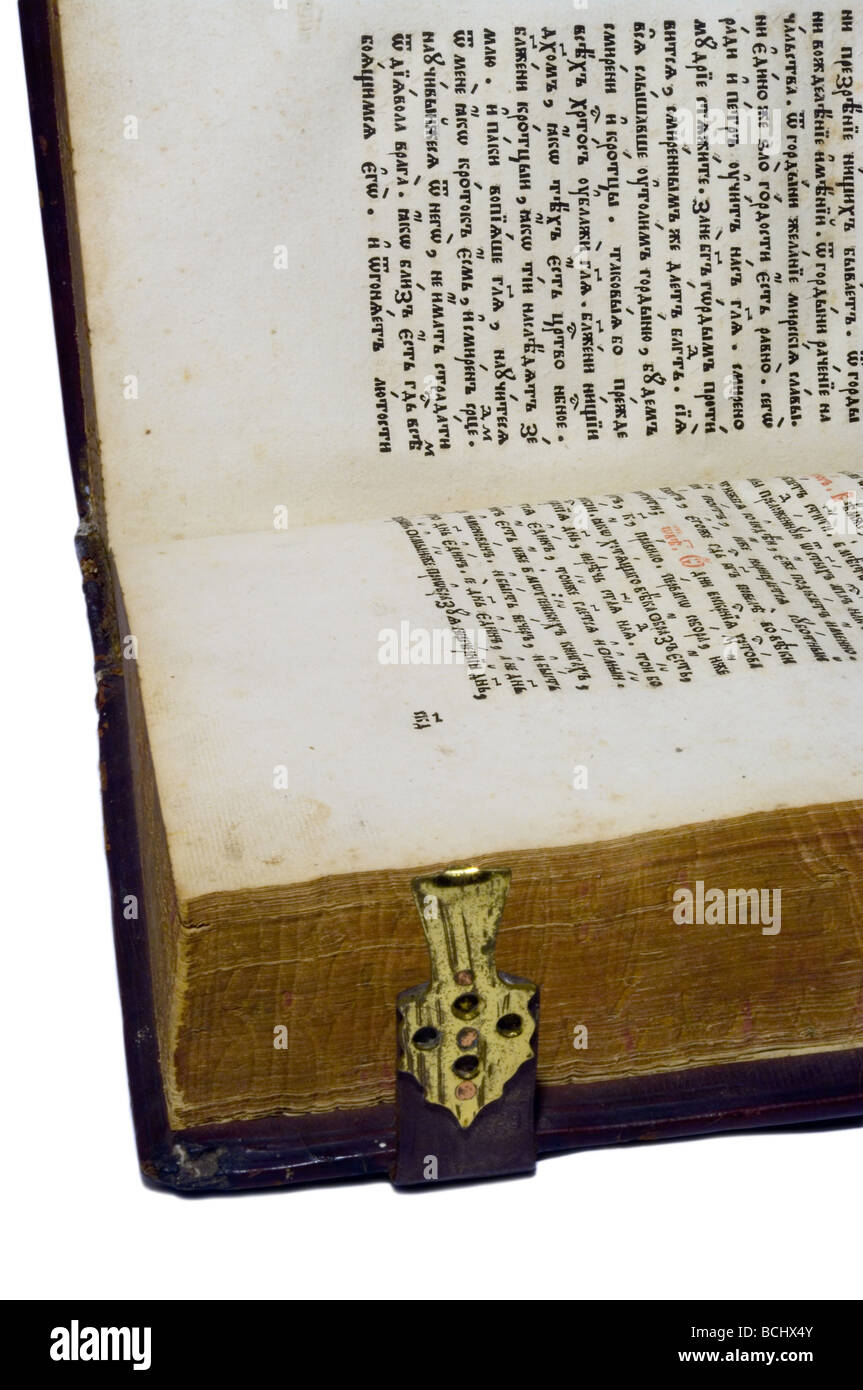 Old big book with hard cover is open. Isolated over white Stock Photo ...