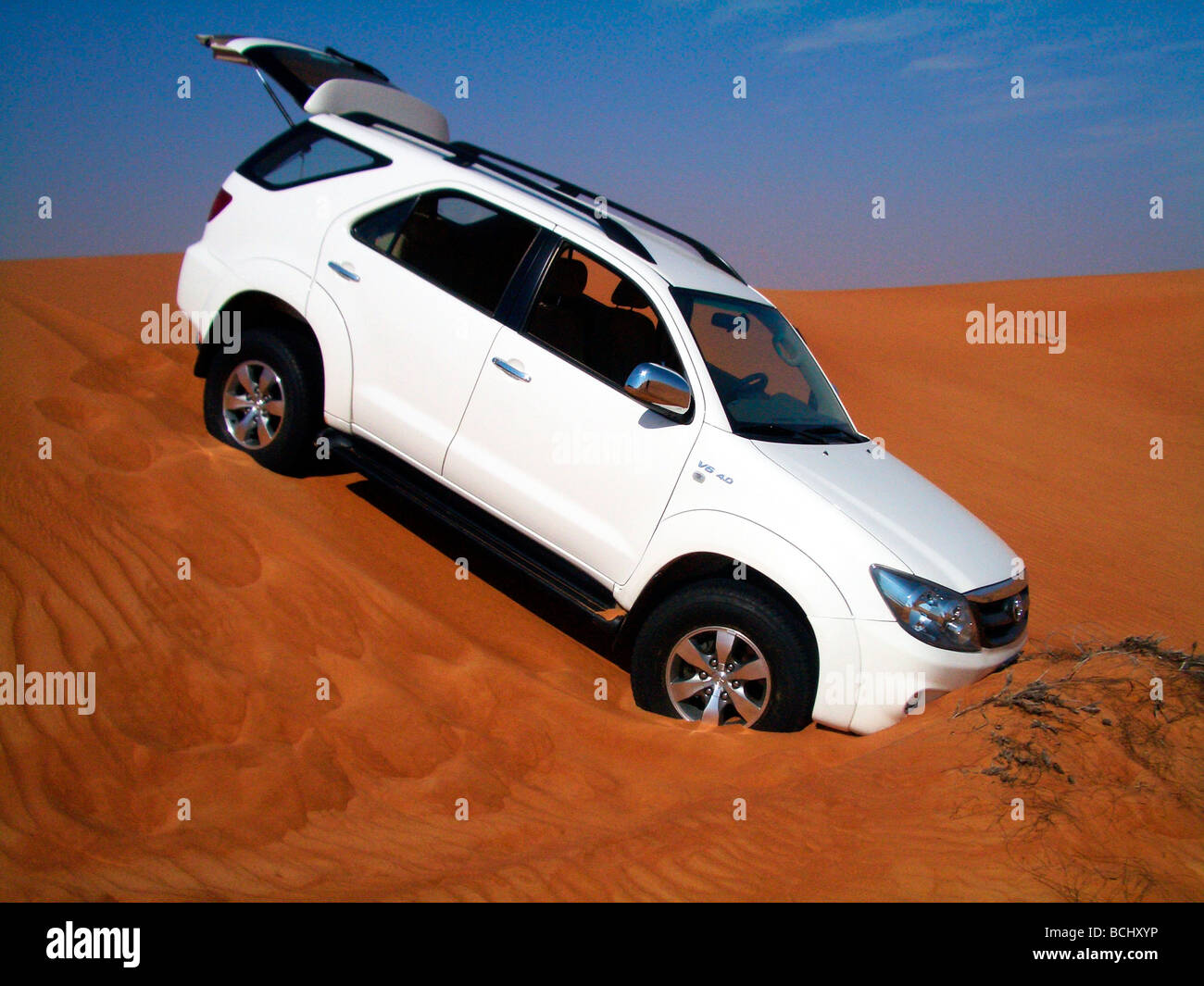 Car stuck in sand hi-res stock photography and images - Alamy
