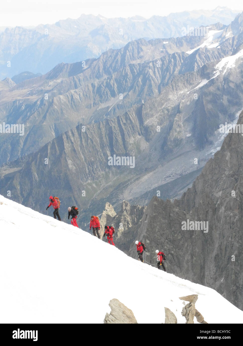 Climbers on Snowfield Stock Photo - Alamy