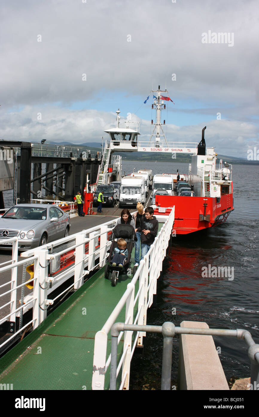 passengers and vehicles disembarking the ferry at McInroy's Point ...