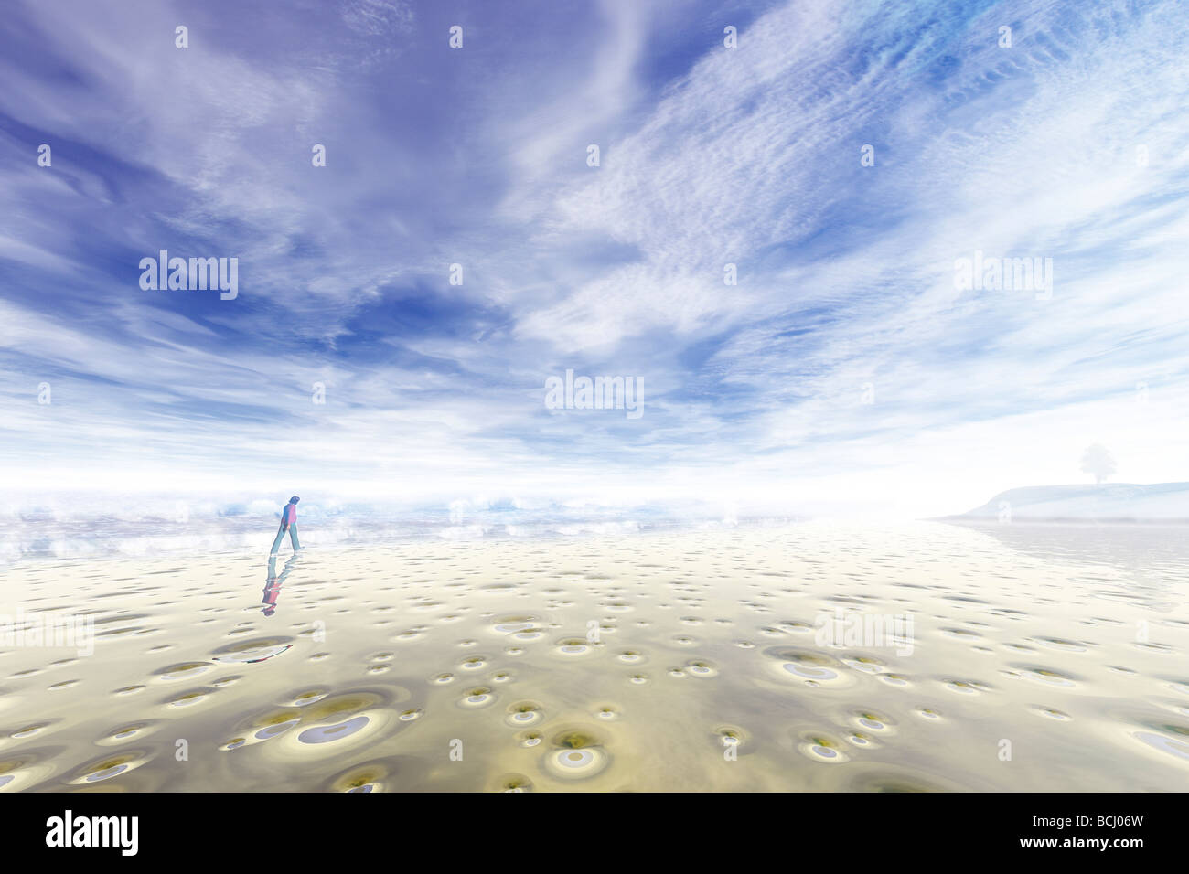 Walker on the beach at low tide Stock Photo - Alamy