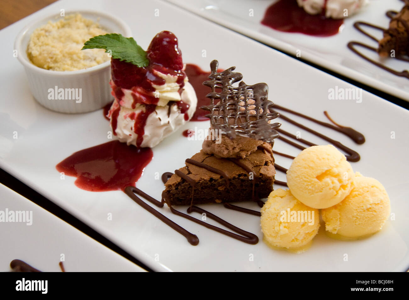 Mini desert Platter - Raspberry Pavlova, Chocolate Fudge Cake and Apple ...