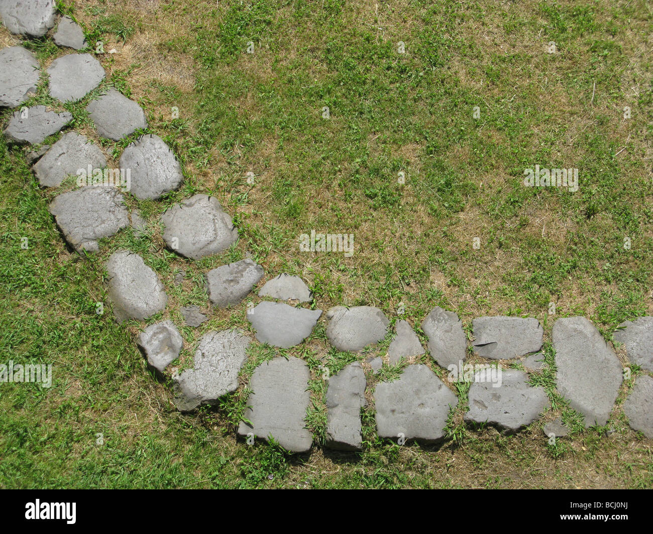 empty rural path made with stone slabs Stock Photo - Alamy