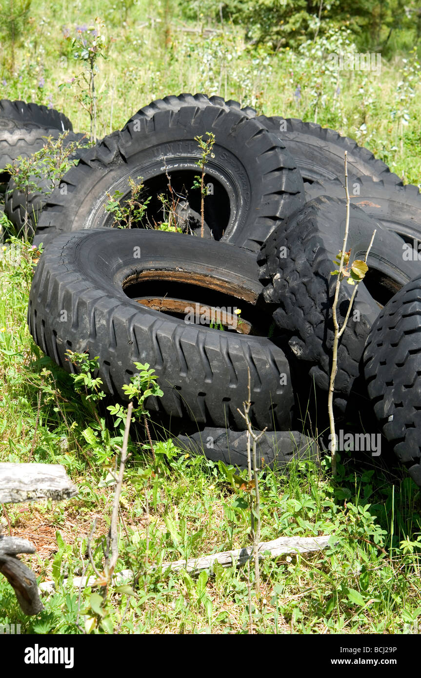 Discarded Tires Dumped in a Field Stock Photo - Alamy