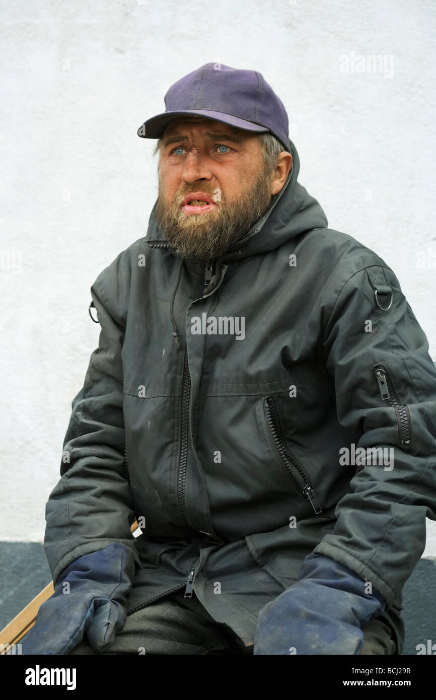Homeless man on a city street Stock Photo - Alamy