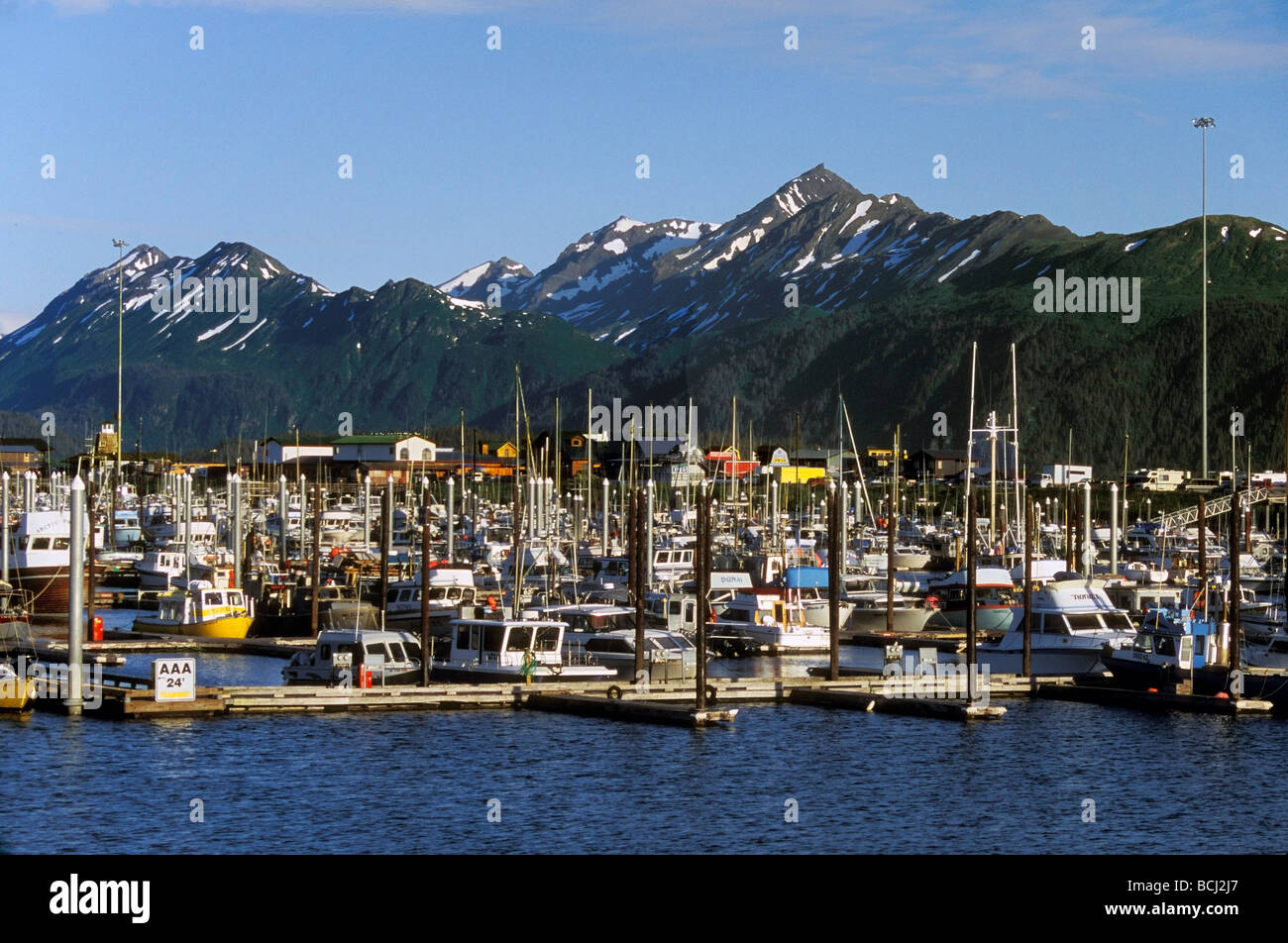 View of the Homer Harbor on the Homer Spit, Kenai Mountains in Kachemak ...