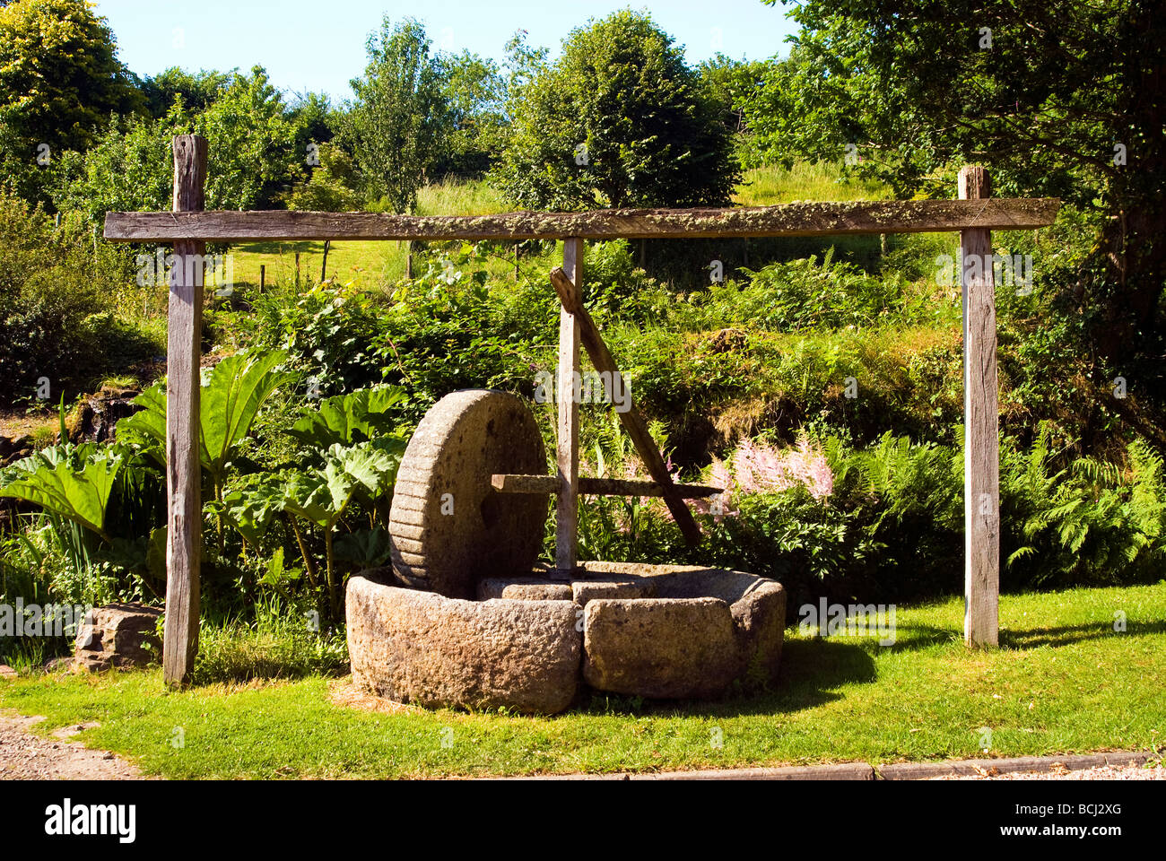 Cider press used as Garden Ornament Stock Photo - Alamy