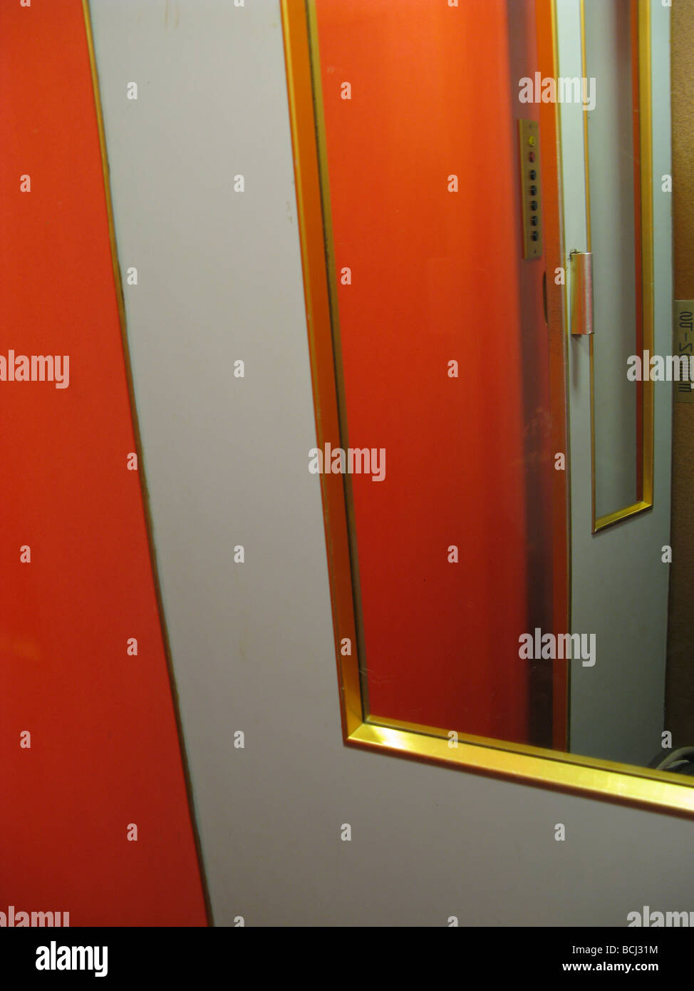 inside colourful red elevator Stock Photo - Alamy