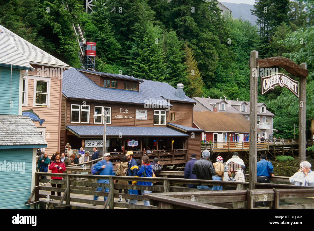 Tourists on Boardwalk of Creek Street Ketchikan AK SE Summer Stock ...