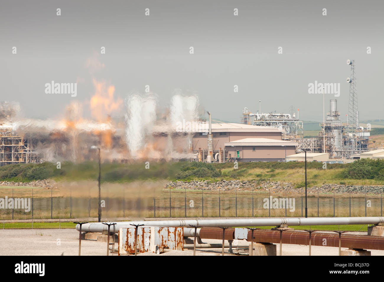 Flaring off gas at a gas processing plant at Rampside near Barrow in ...