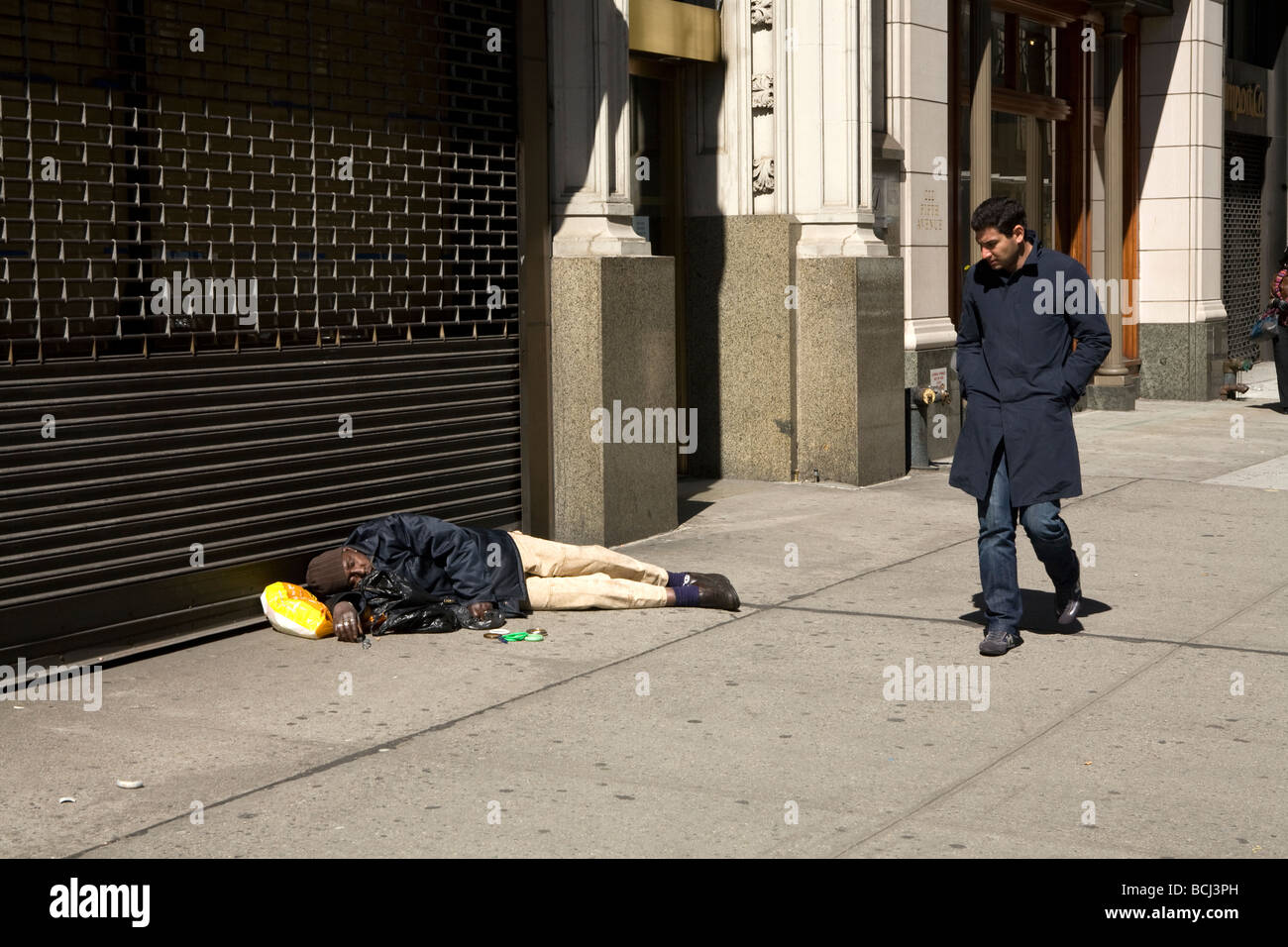 Homeless usa passing hi-res stock photography and images - Alamy