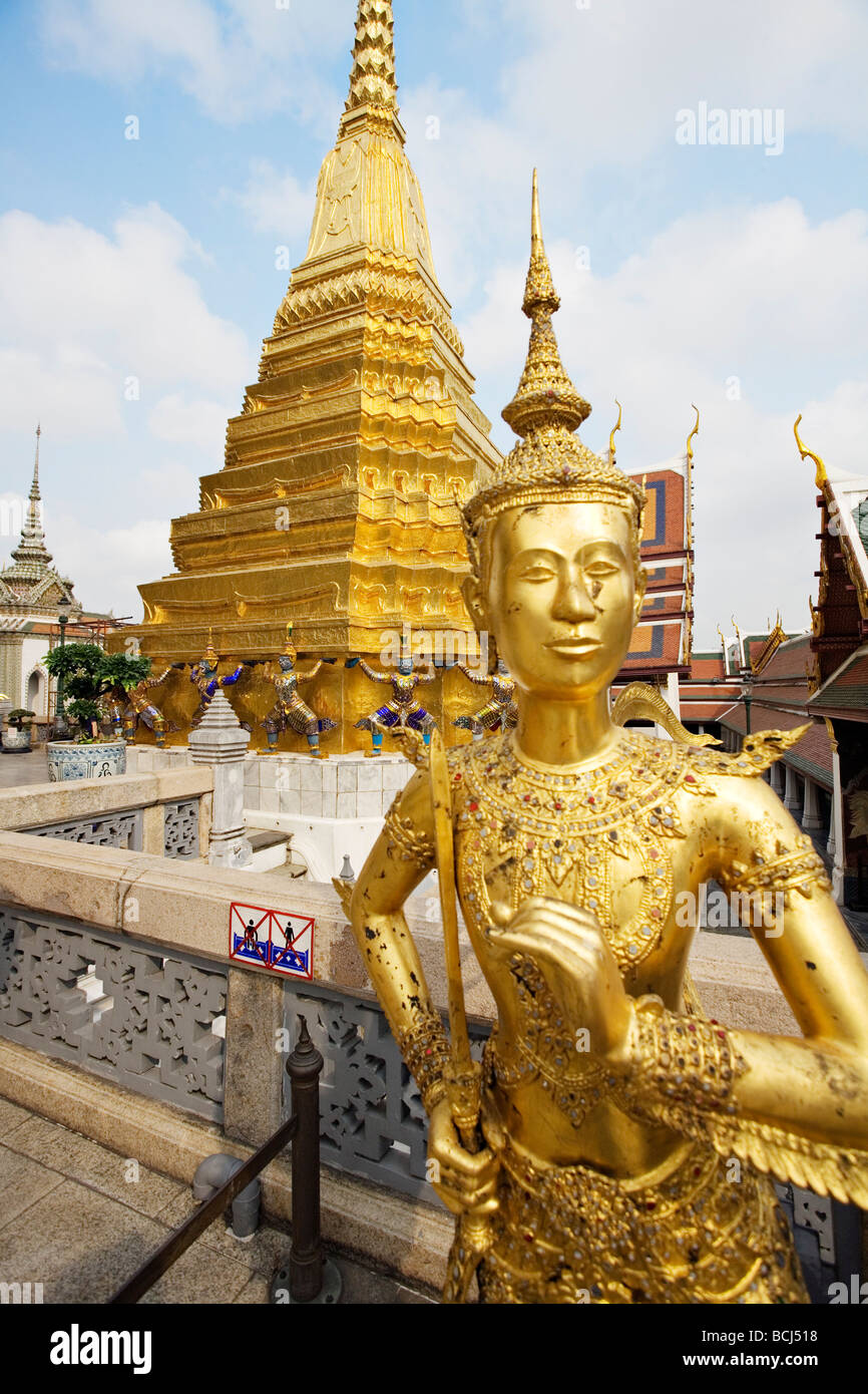 Golden statue within the gates of the Grand Place in Bangkok Thailand ...