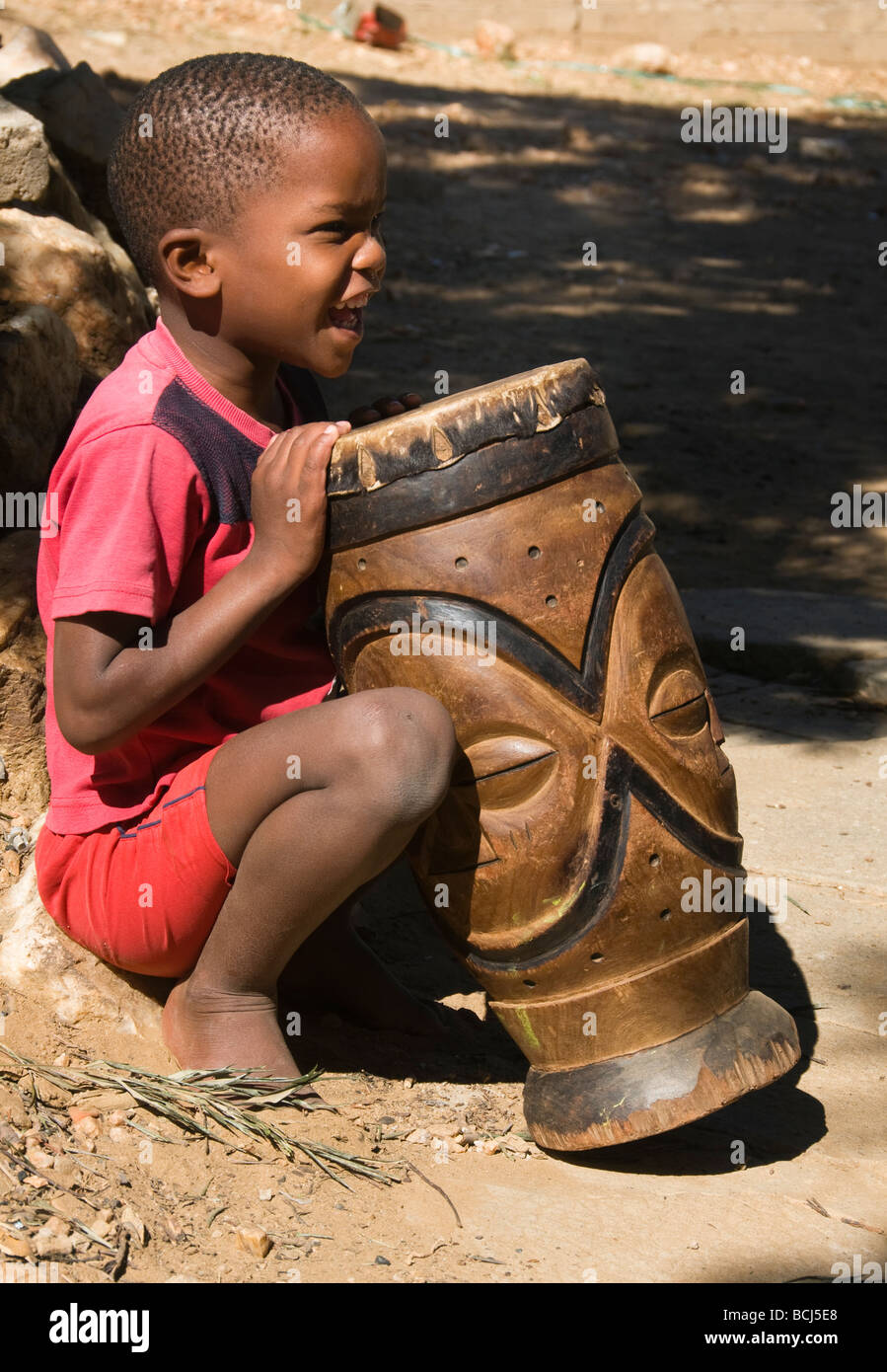 little drummer boy in an orphanage in Windhoek Namibia Stock Photo - Alamy