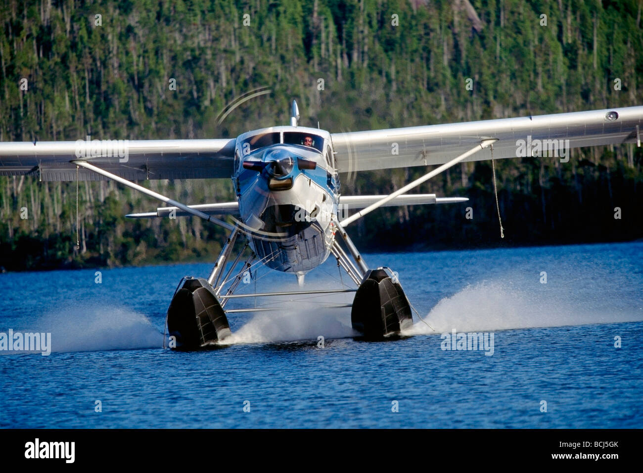 Turbo powered Otter on floats over lake Taquan Air Southeast Alaska ...