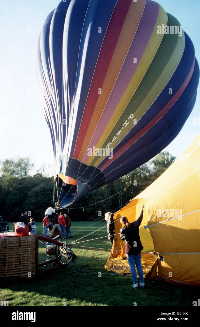 Blowing up a balloon woman hi-res stock photography and images - Alamy