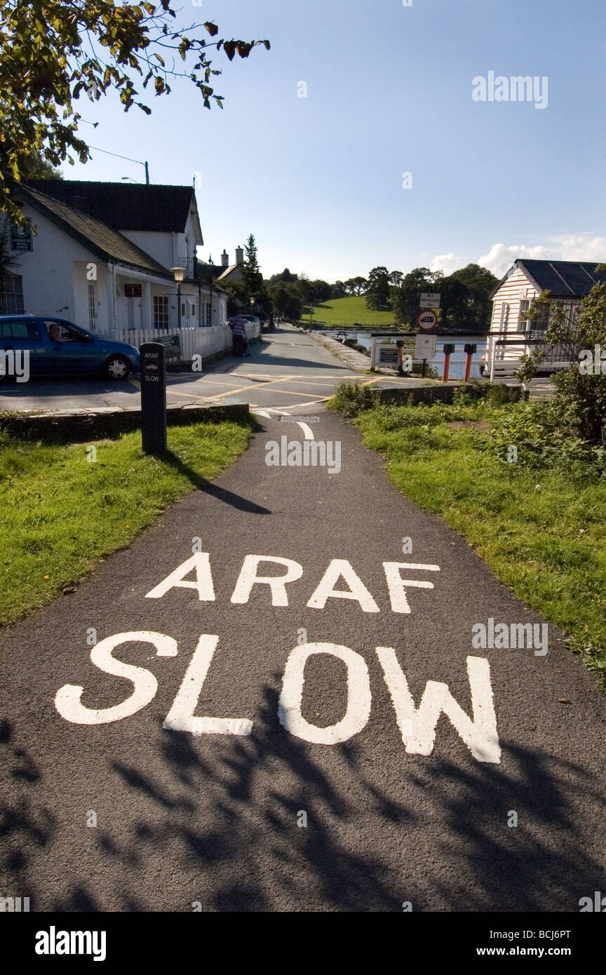 Slow sign uk painted road hi-res stock photography and images - Alamy