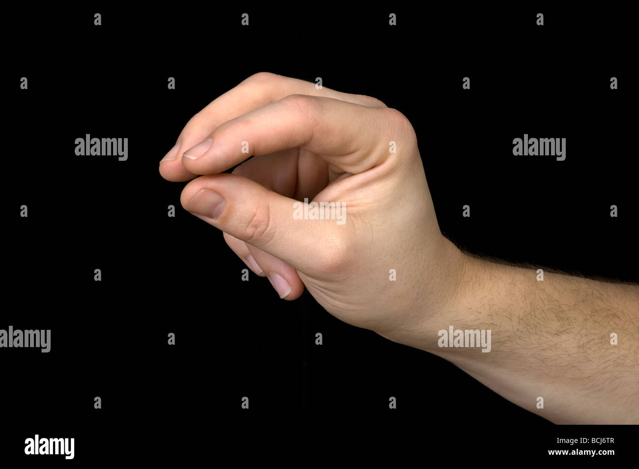 male hands against black Stock Photo - Alamy