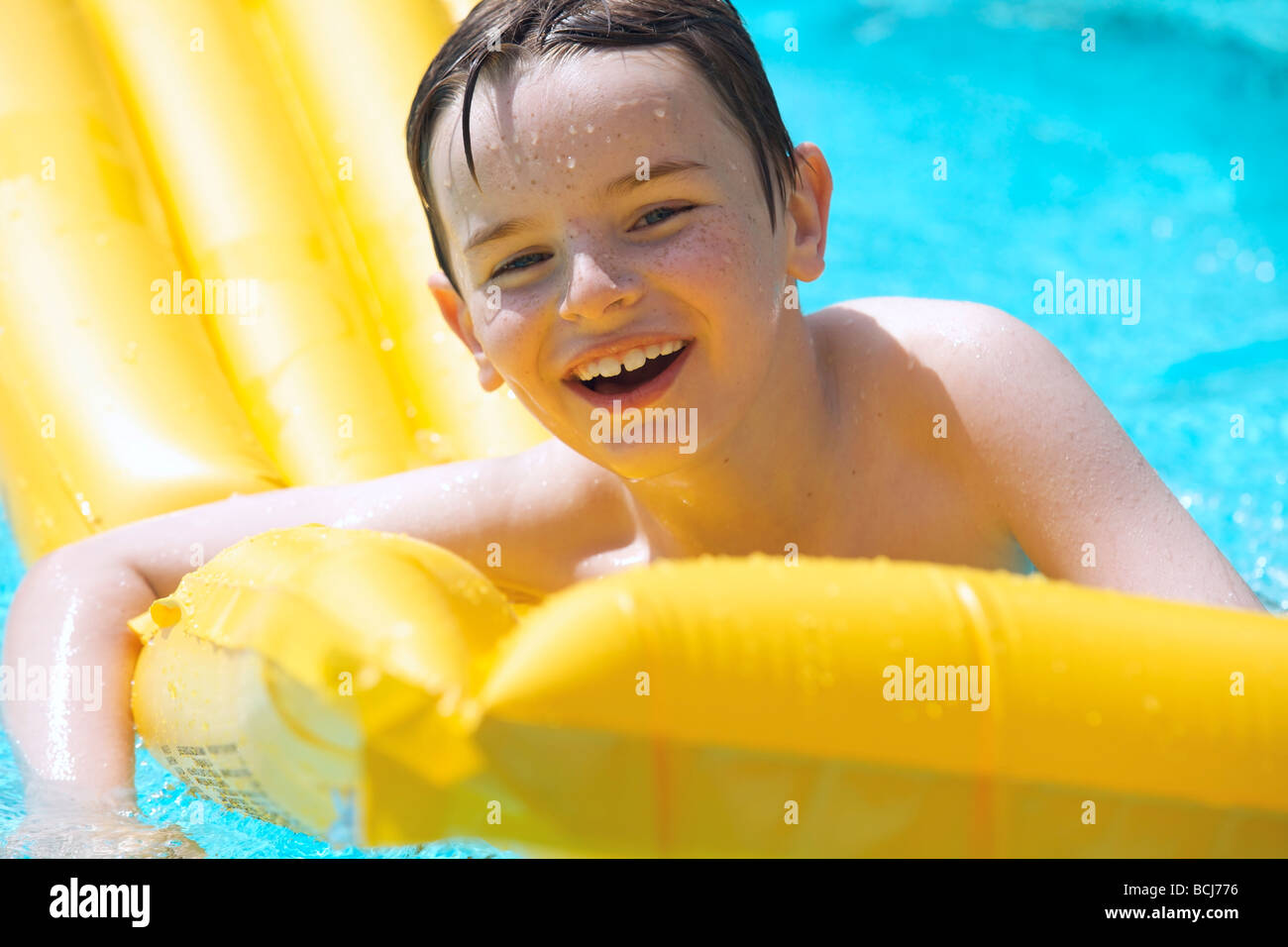 Yellow lilo hi-res stock photography and images - Alamy
