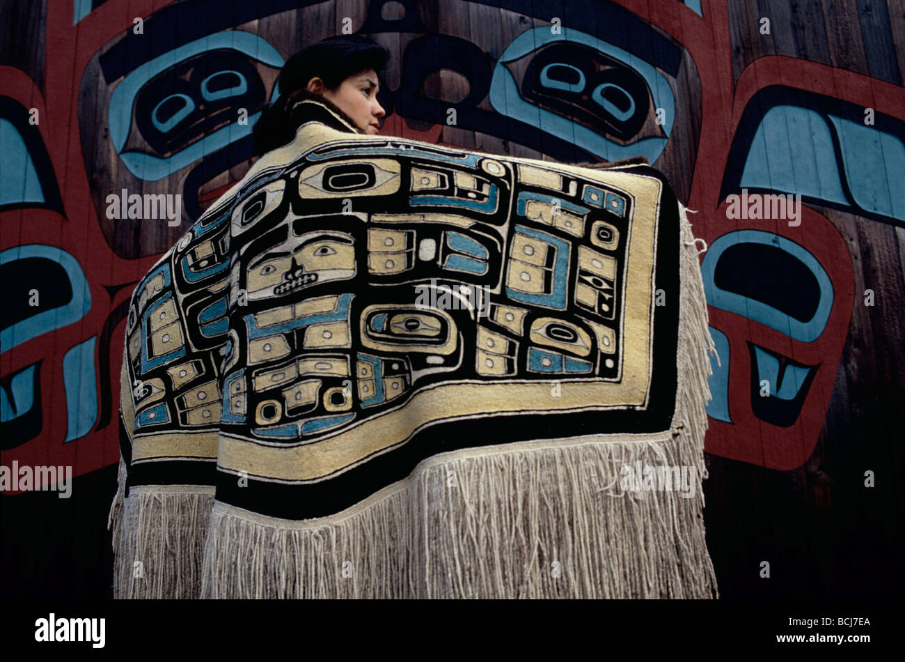 Tlingit woman displays traditional blanket SE AK Saxman village Alaska ...