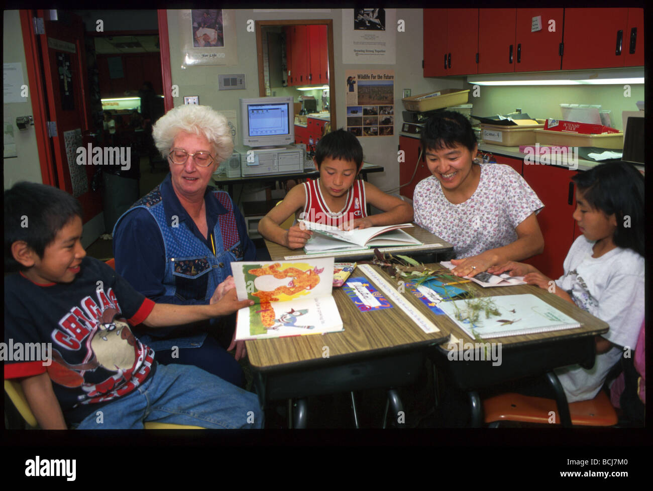 Teacher & students in classroom Noatak Western AK portrait Stock Photo ...