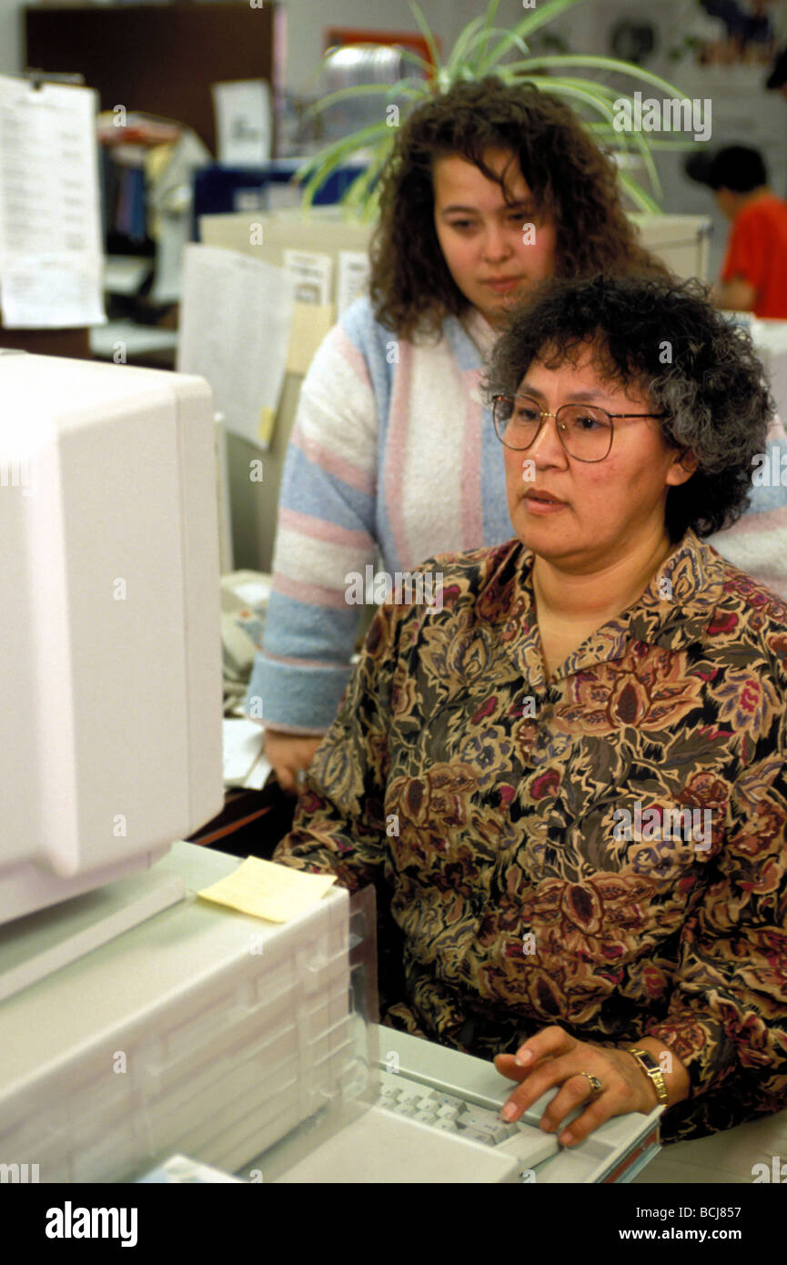 Inupiat woman working office at computer Barrow Arctic AK portrait ...