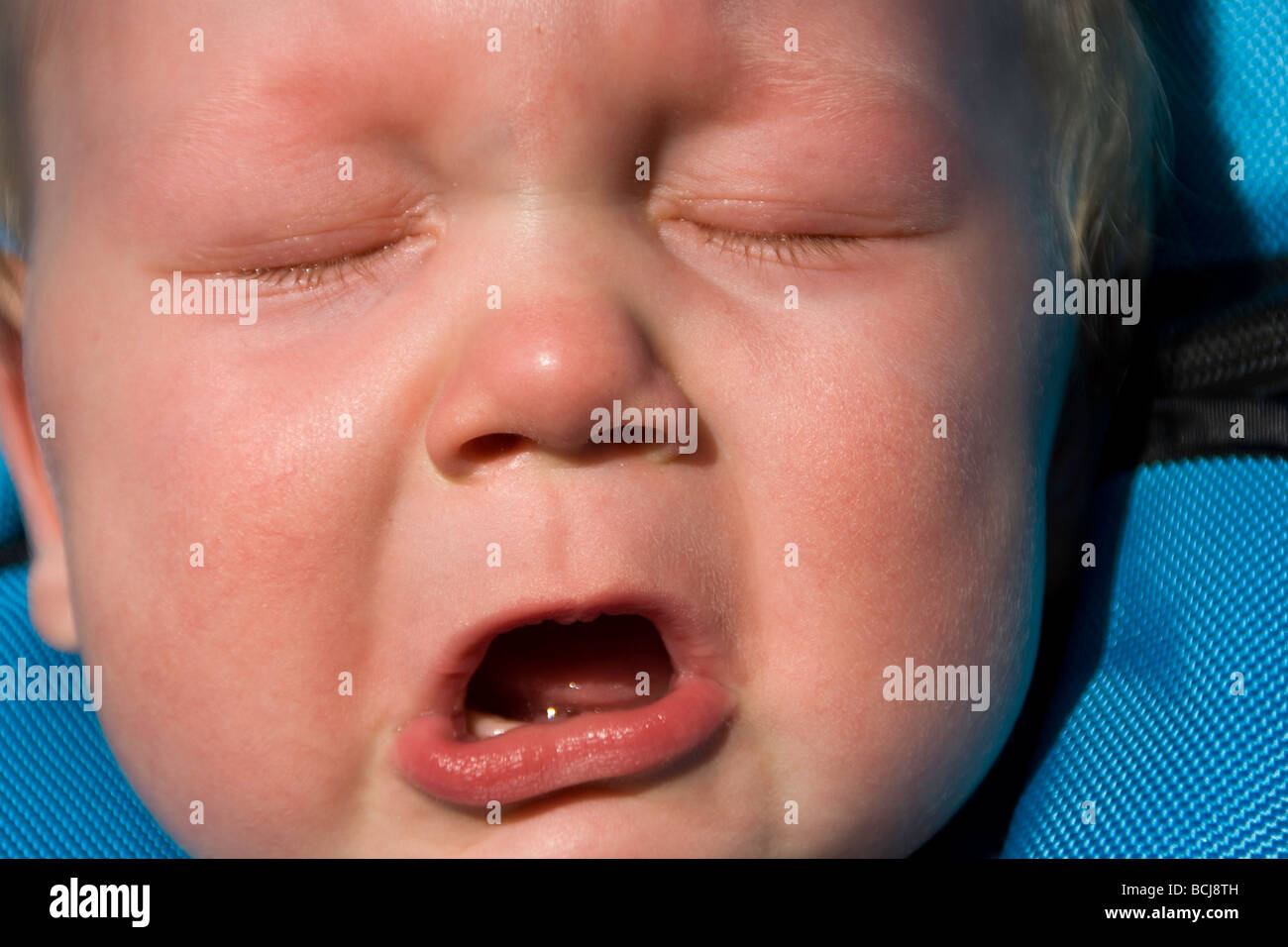 Crying baby face hi-res stock photography and images - Alamy