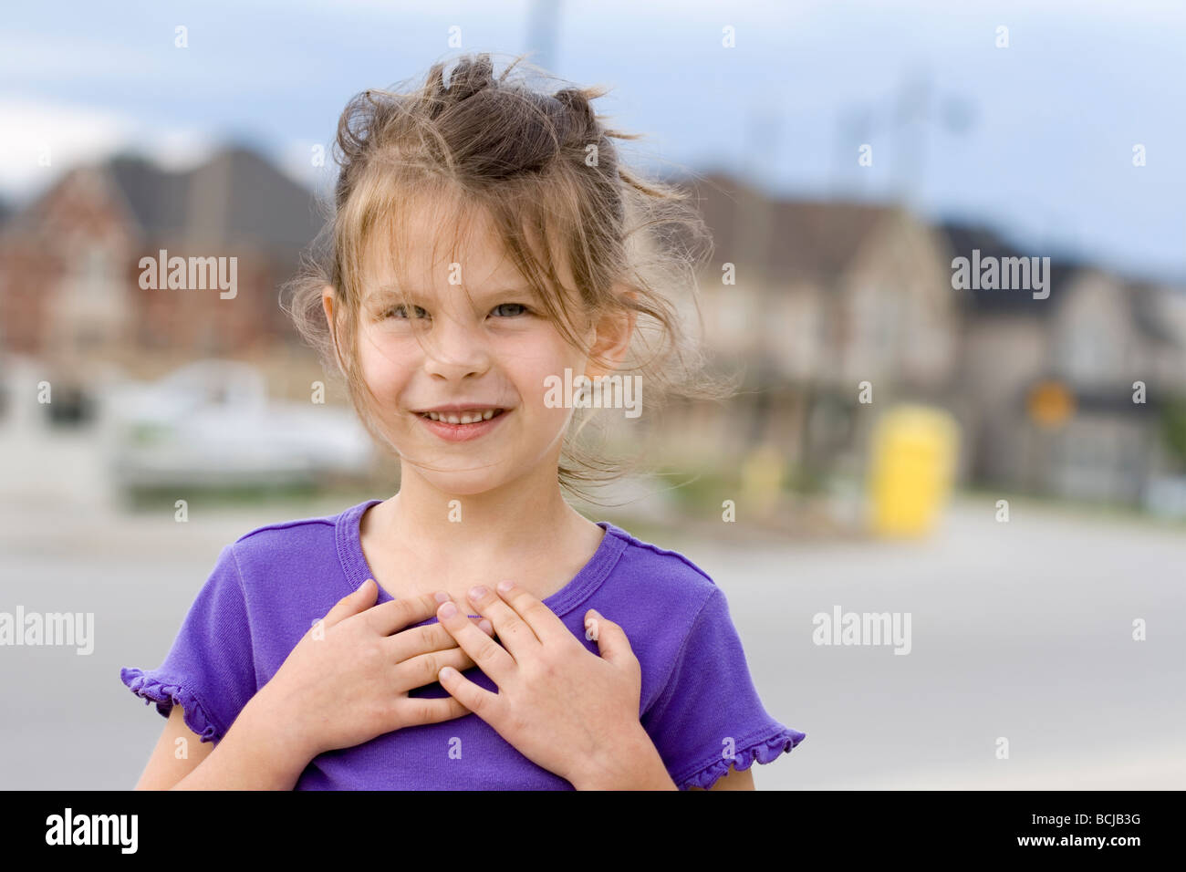 young girl with tousled hair Stock Photo - Alamy