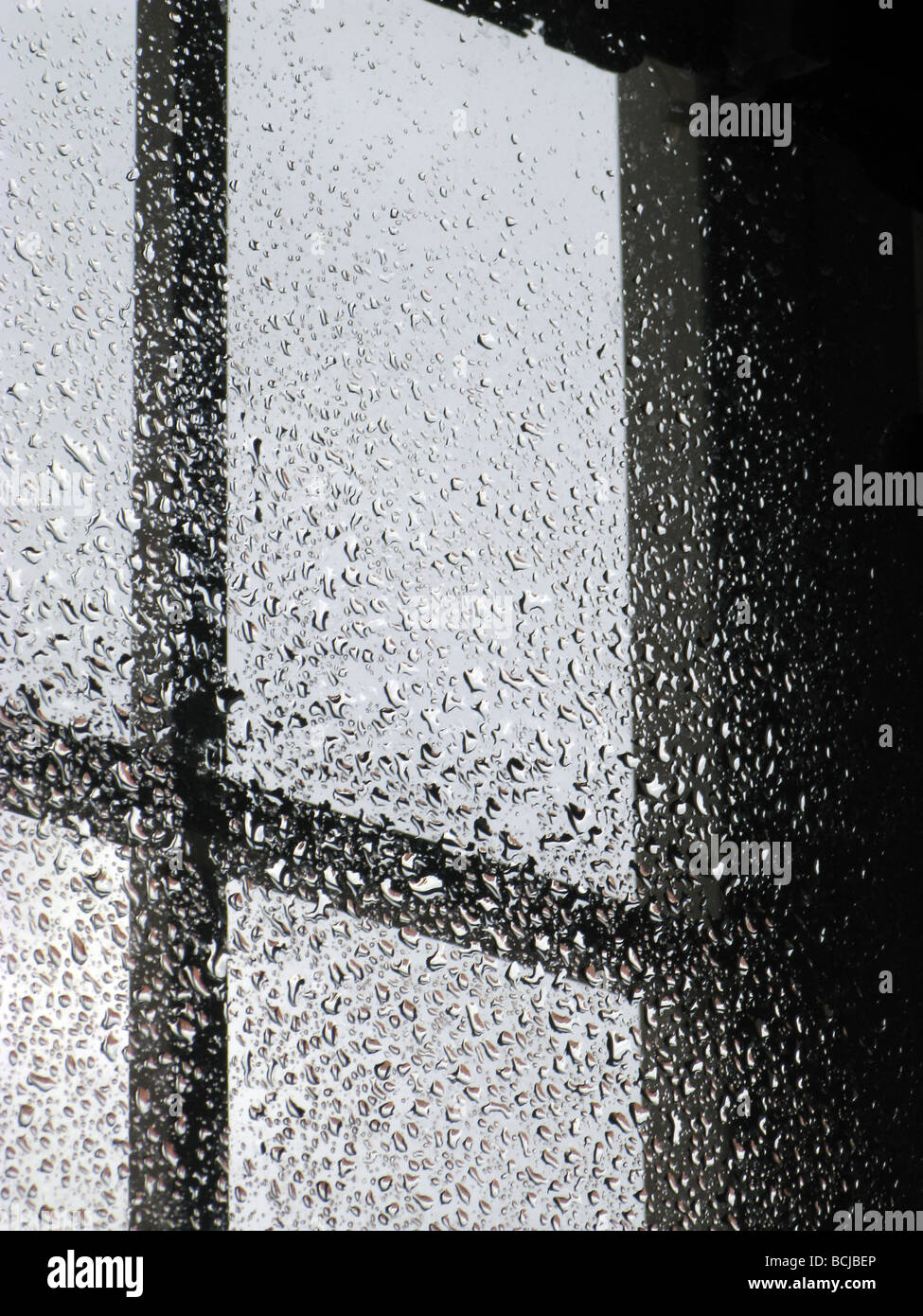 rain drops covered window seen from inside dark room Stock Photo - Alamy